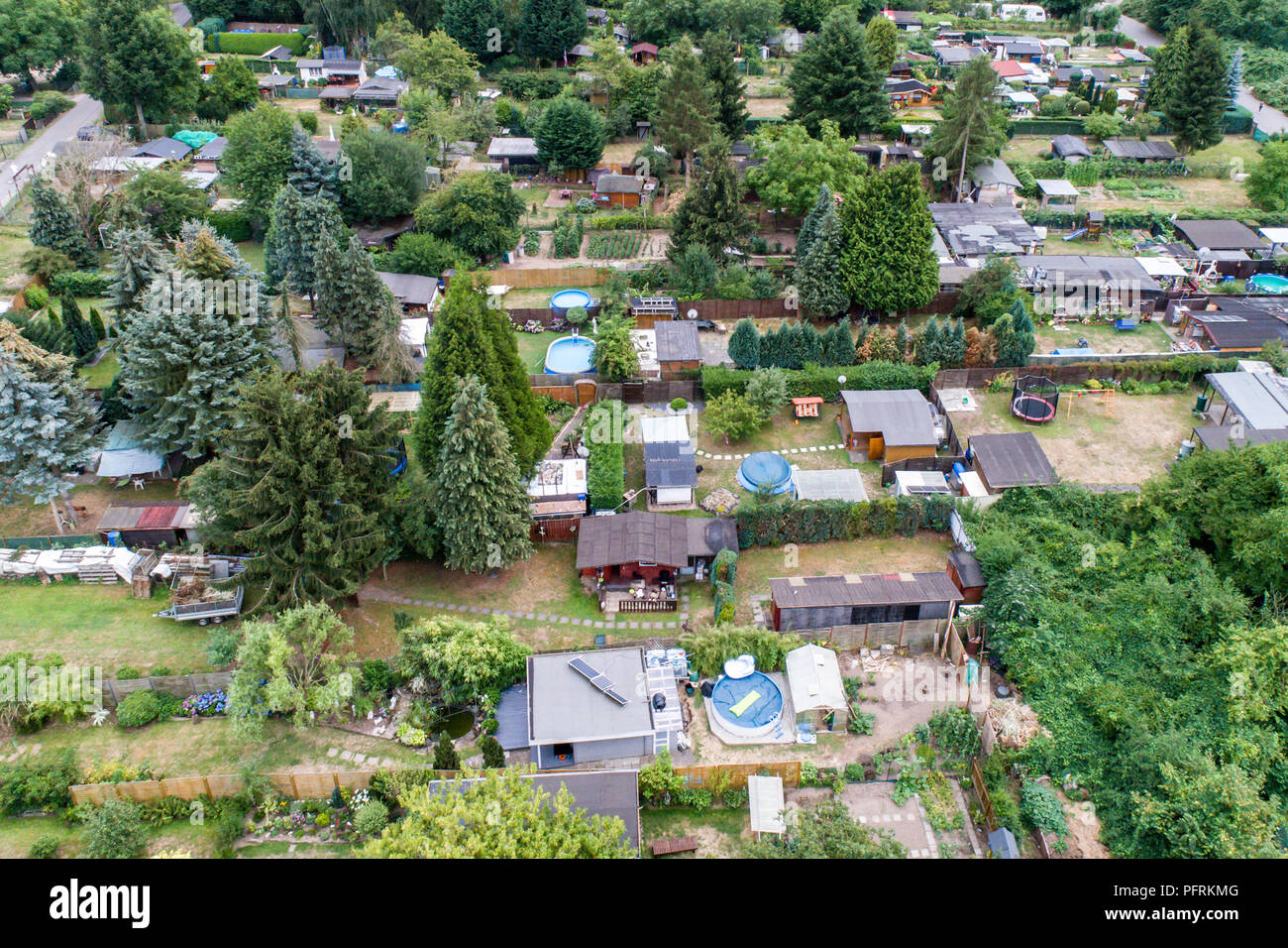 Aerial photo with the drone, a new build-up plot with single houses and ...