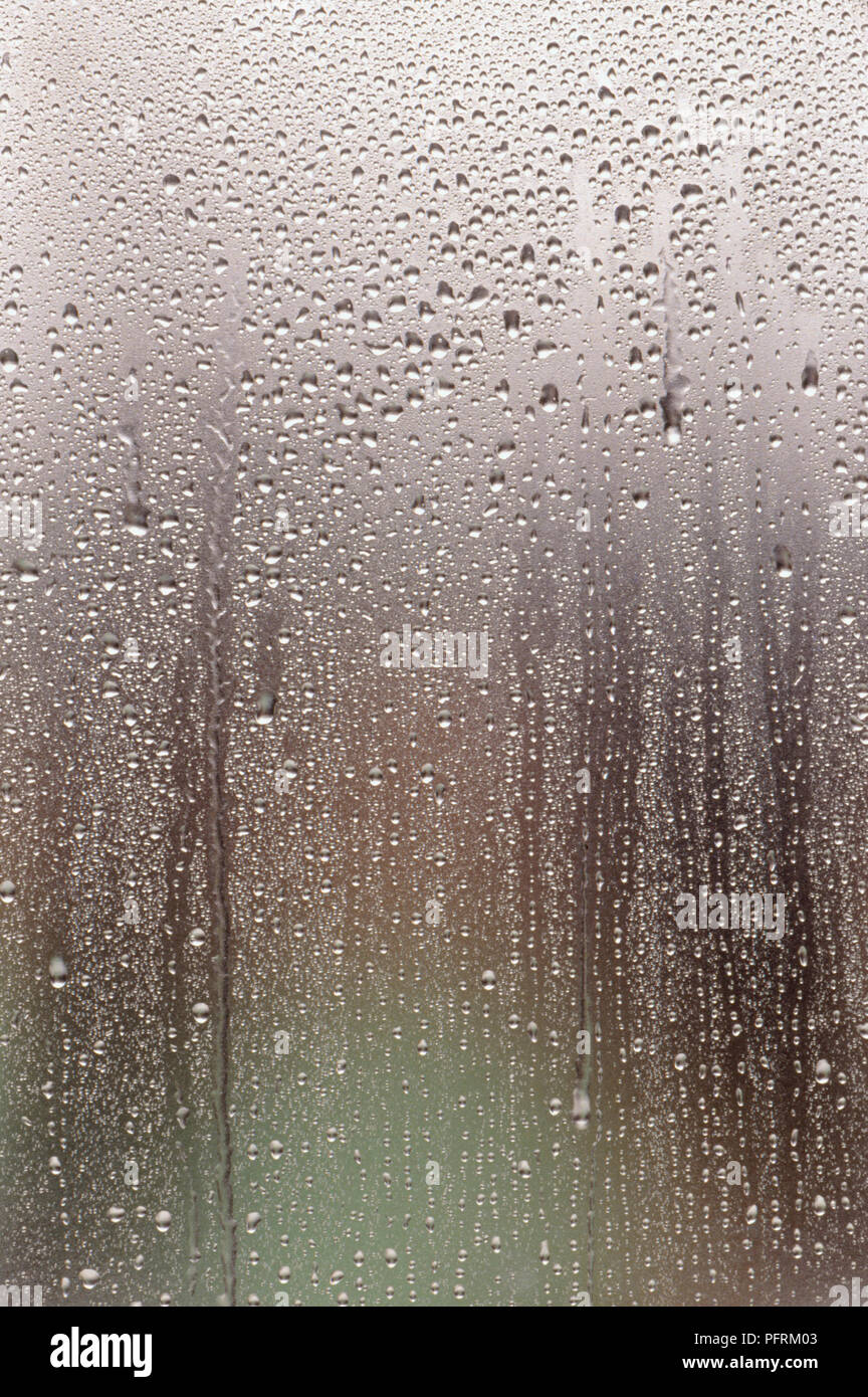 Water dripping down sheet of metal Stock Photo - Alamy