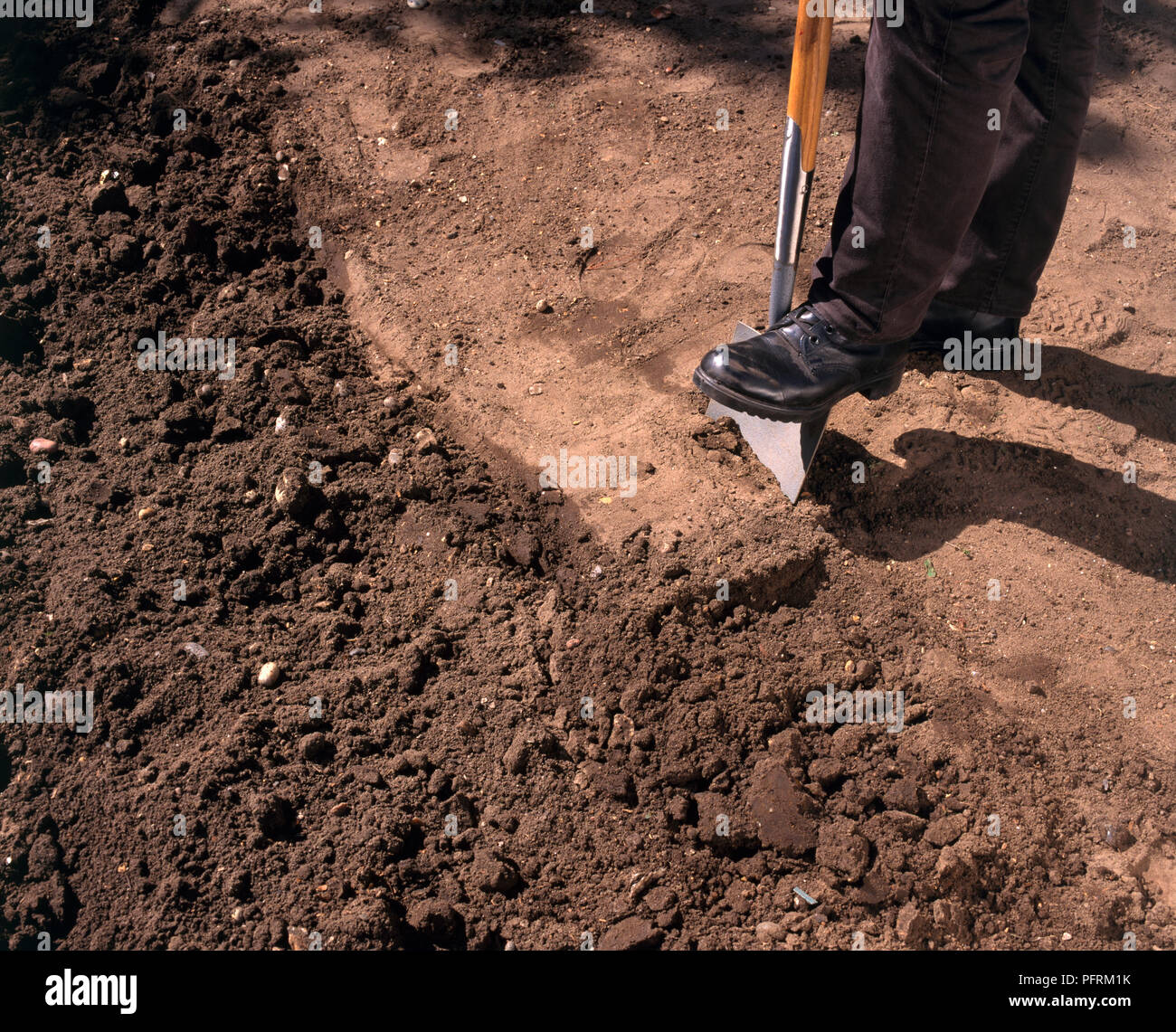 Man digging with spade hi-res stock photography and images - Alamy