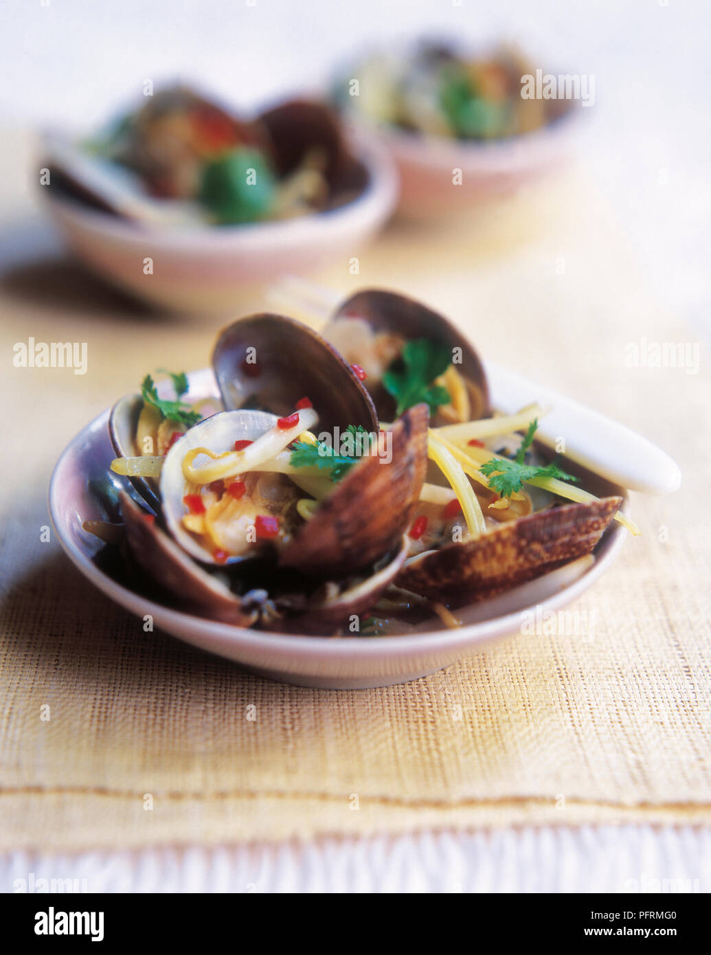 Malaysian fried bean sprouts and clams (Taugeh masak kerang), served in ...