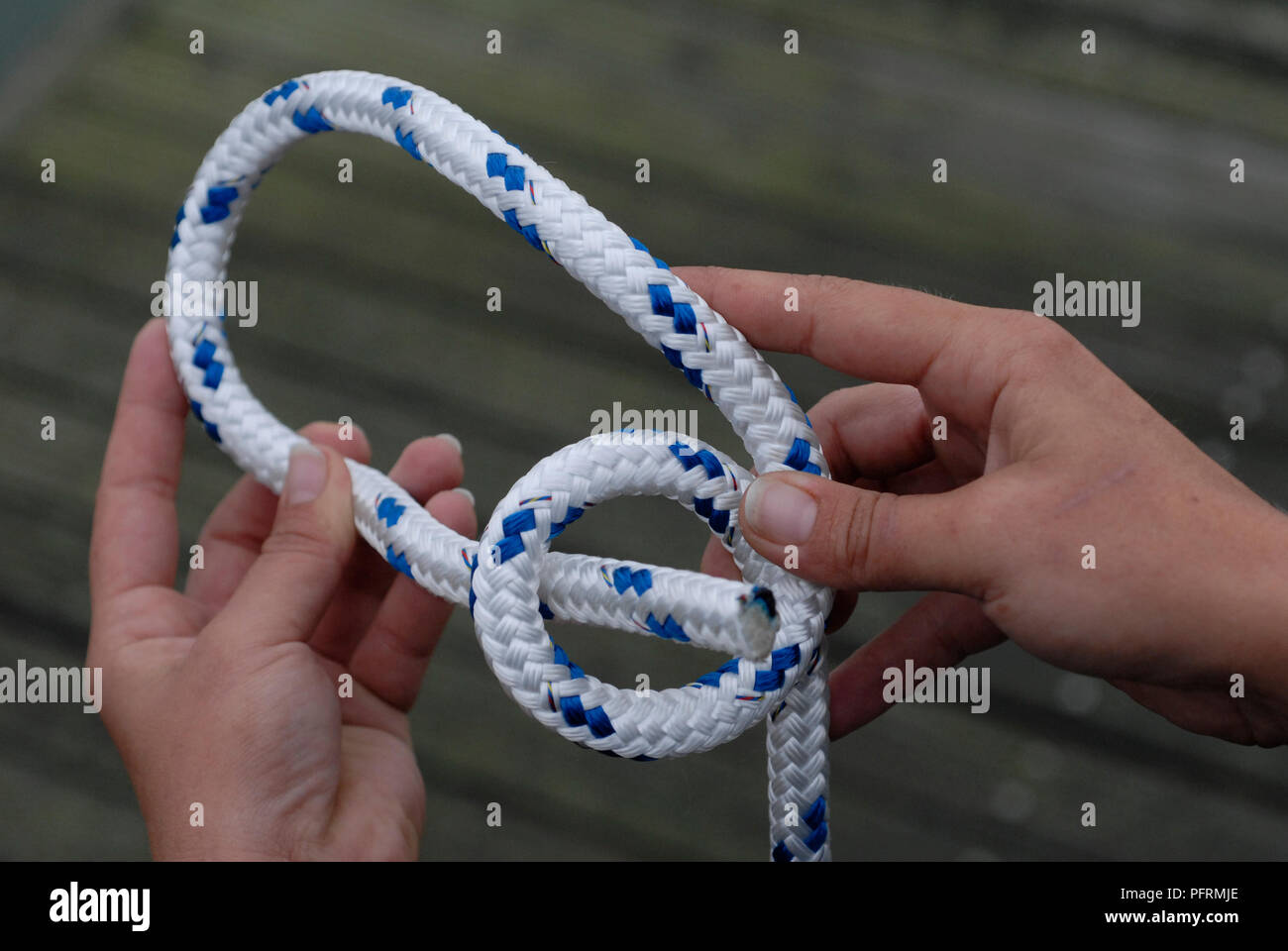 Women hands tied rope hi-res stock photography and images - Alamy