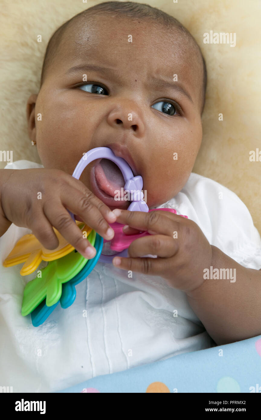 Close up baby girl chewing hi-res stock photography and images - Alamy