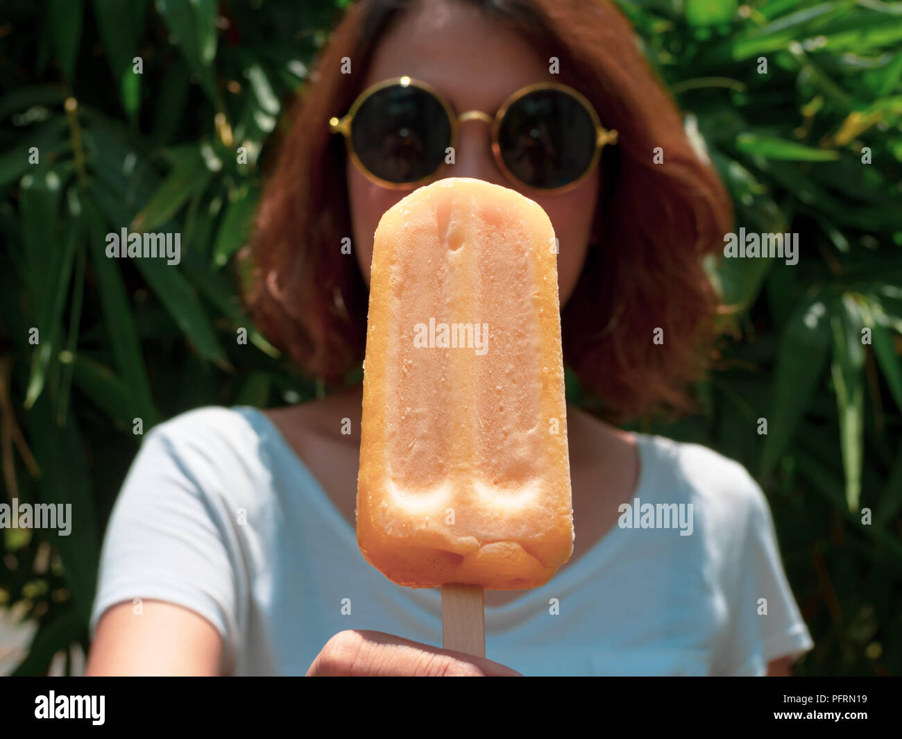 Beautiful Woman Short Hair Wearing White Shirt and Round Sunglasses ...