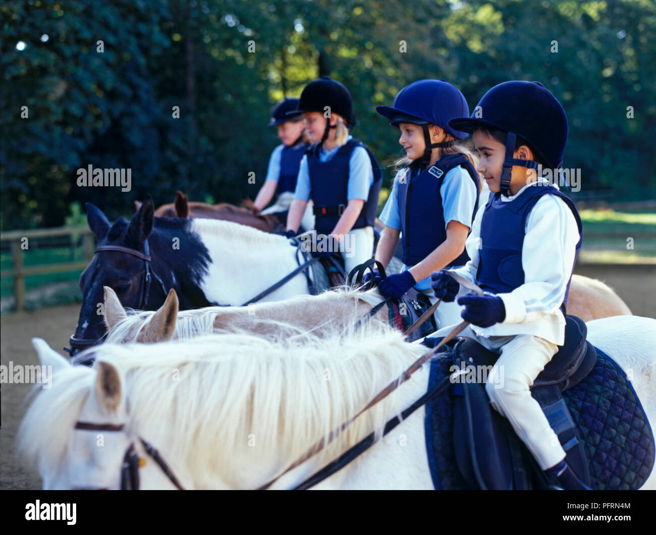Group riding lesson children hi-res stock photography and images - Alamy