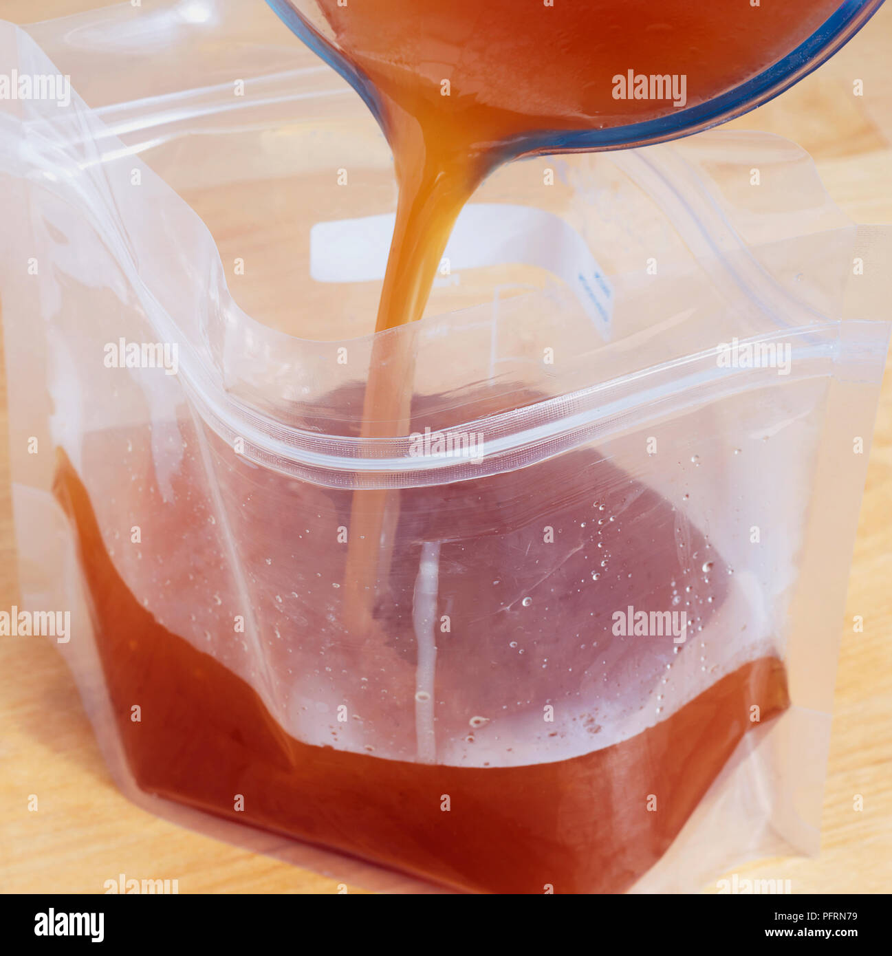 Plastic container gravy hi-res stock photography and images - Alamy