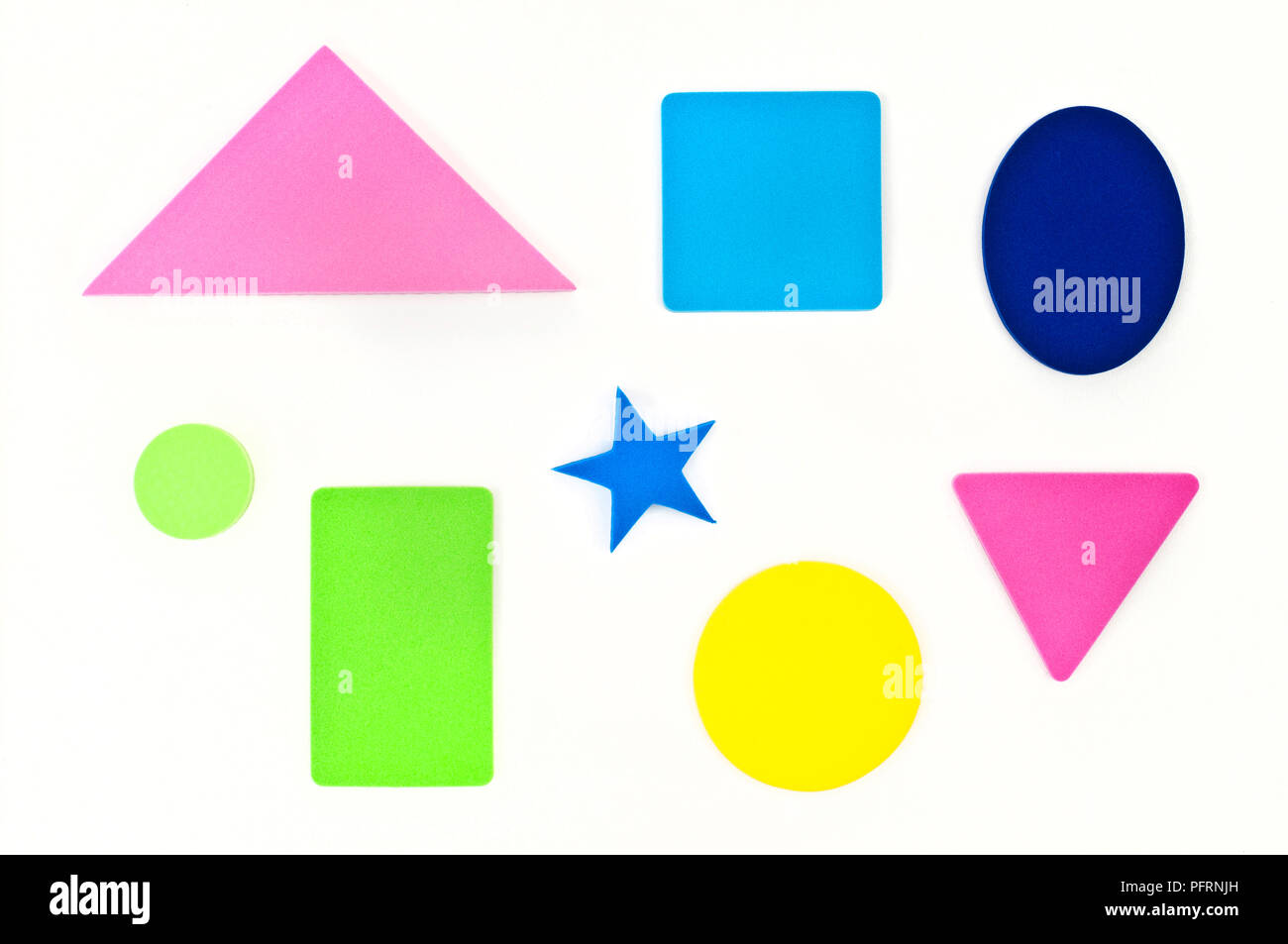 Various, colourful cut-out shapes Stock Photo - Alamy