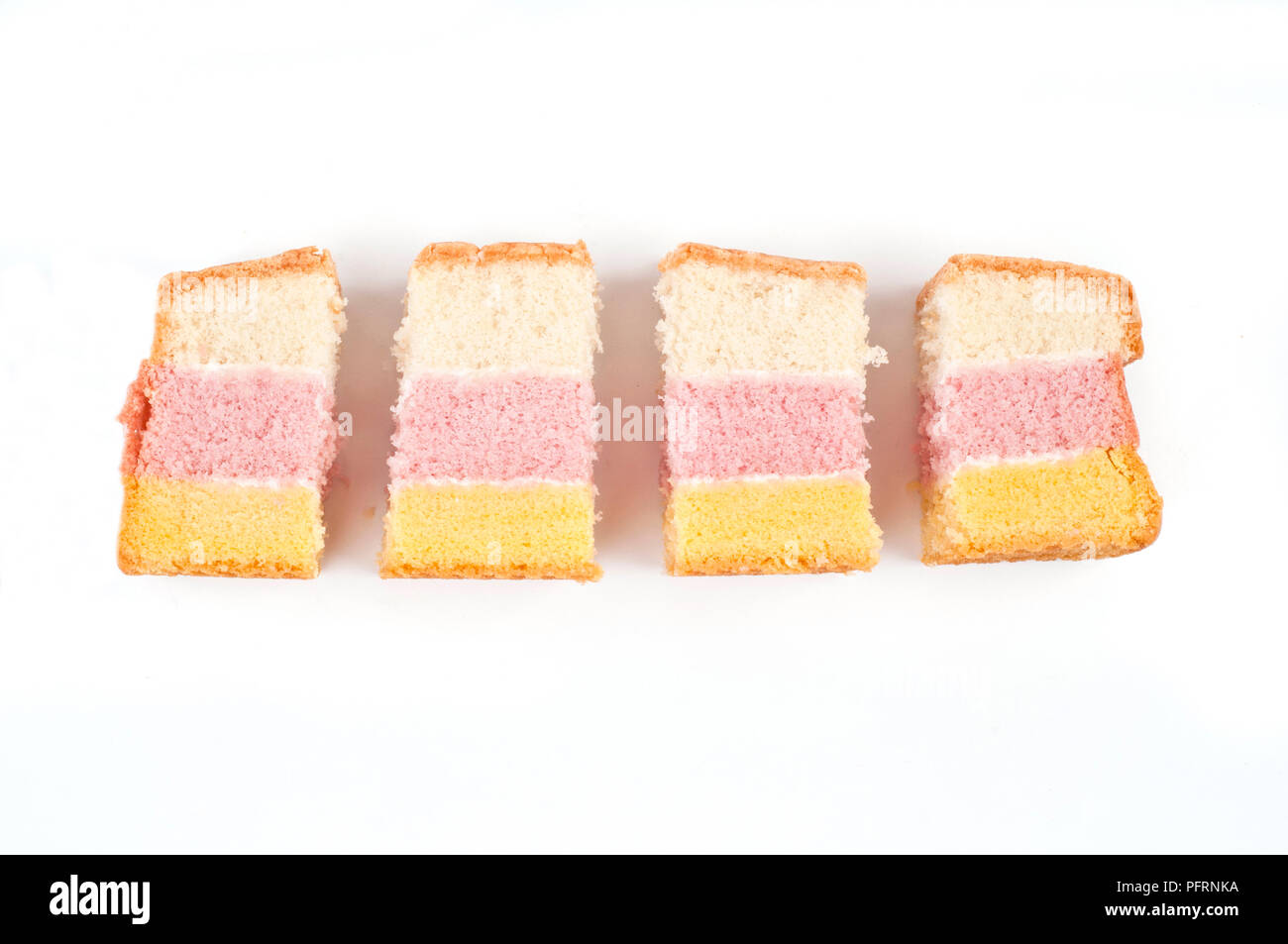 Angel cake sliced into four pieces Stock Photo - Alamy