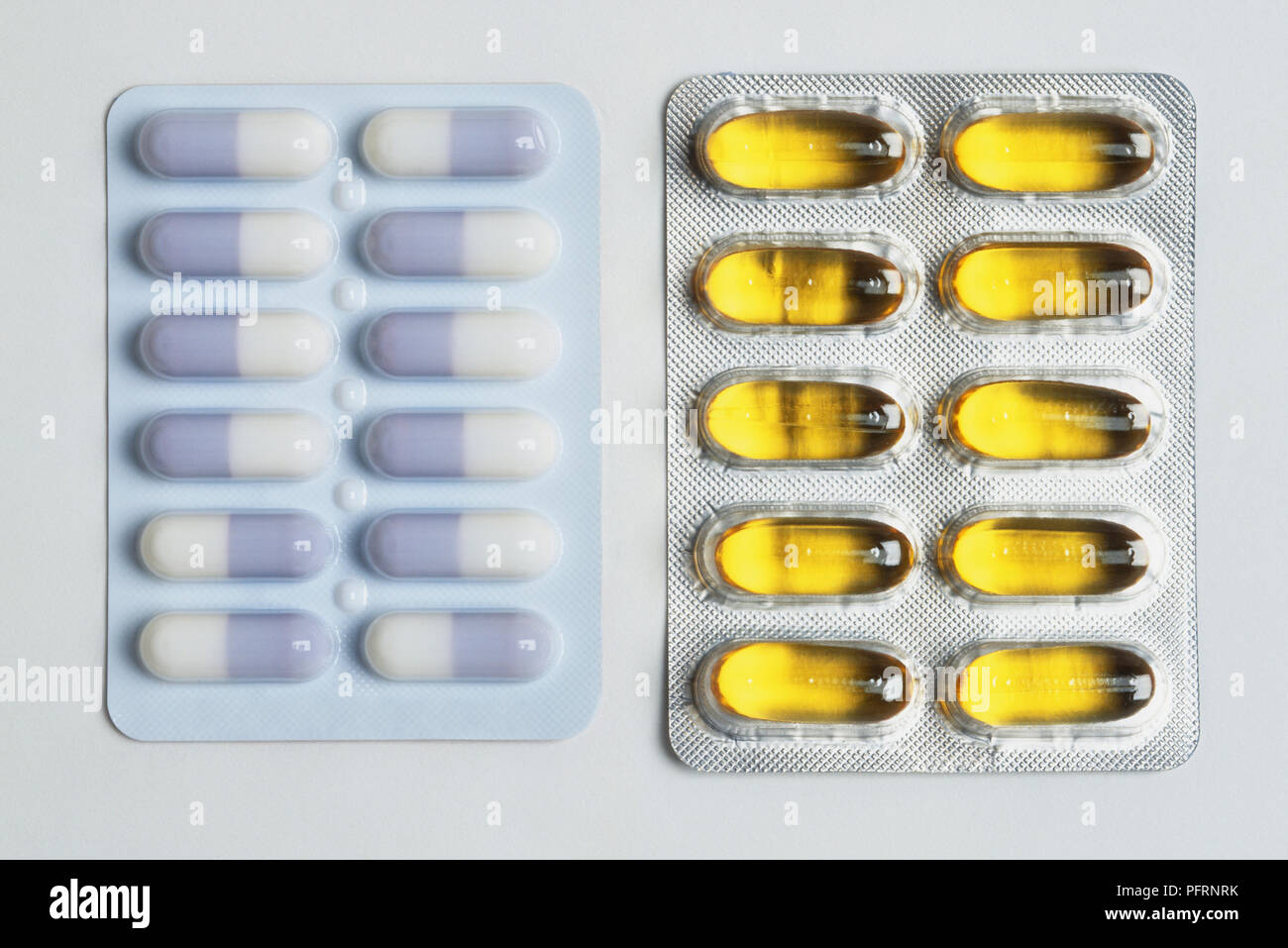 Capsule tablets and gel tablets in blister packs Stock Photo - Alamy