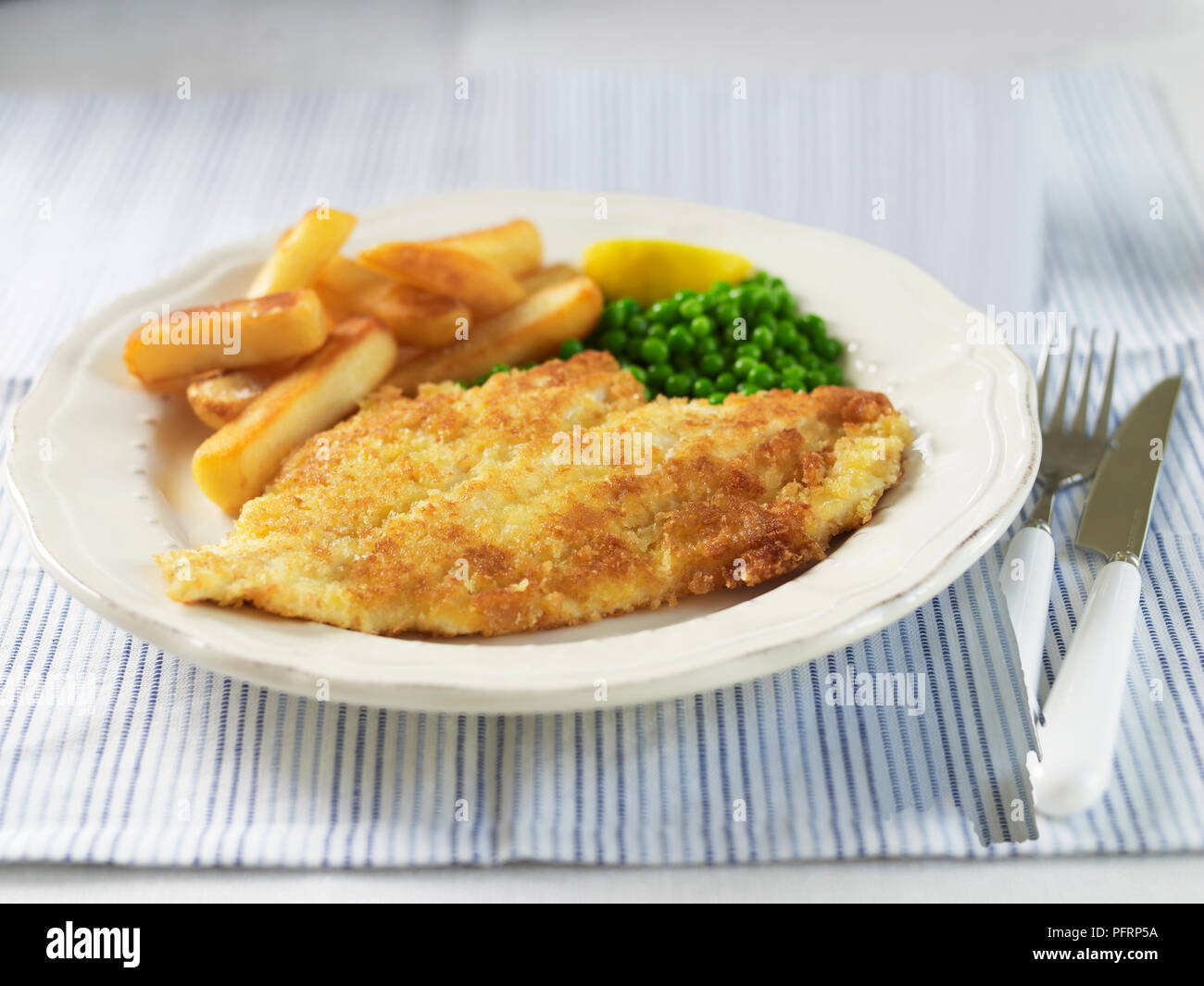 Fish and chips with peas Stock Photo - Alamy