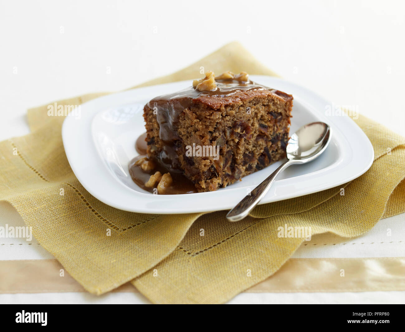 Sticky toffee pudding on a plate Stock Photo - Alamy