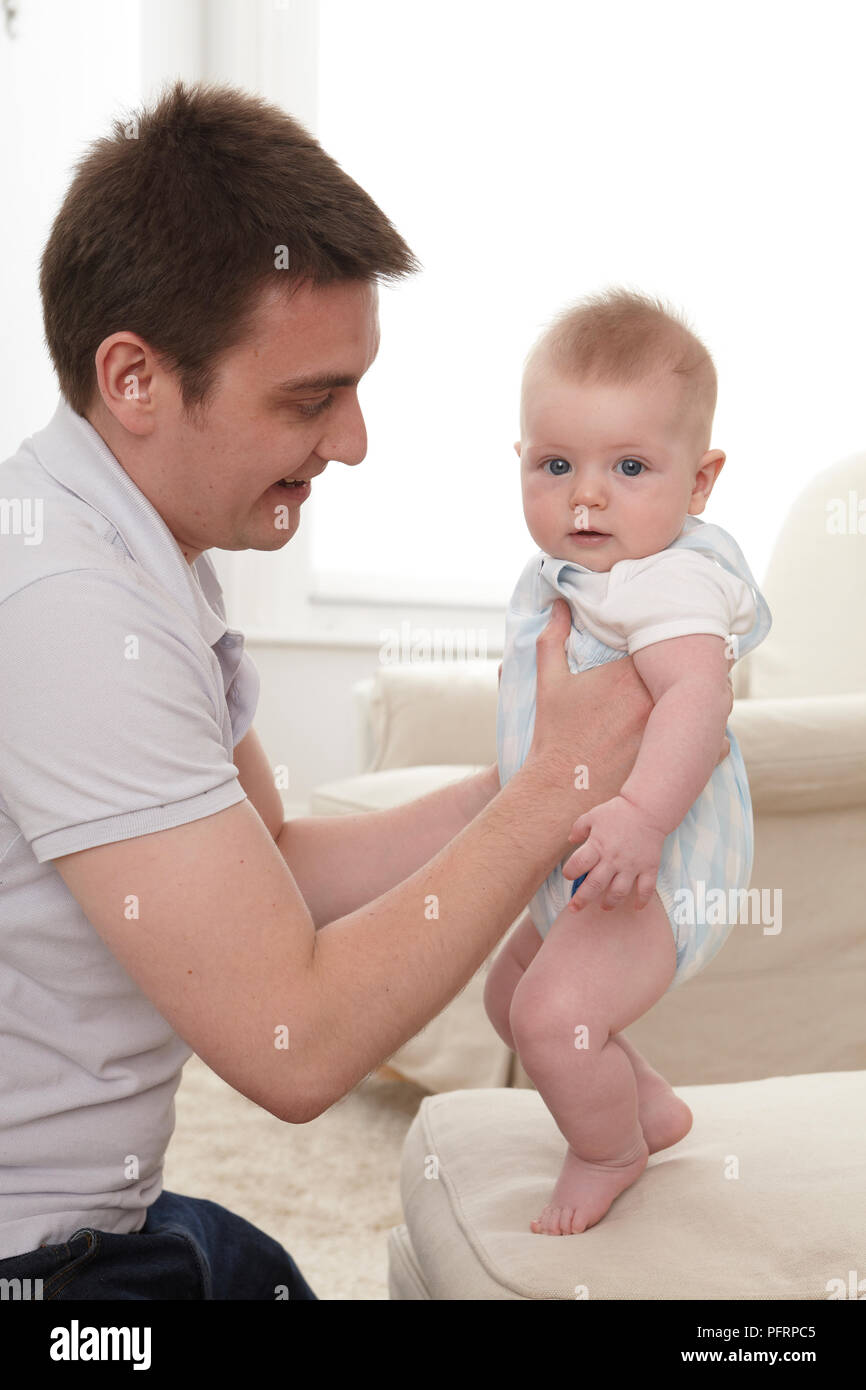 Father lifting baby boy hi-res stock photography and images - Alamy
