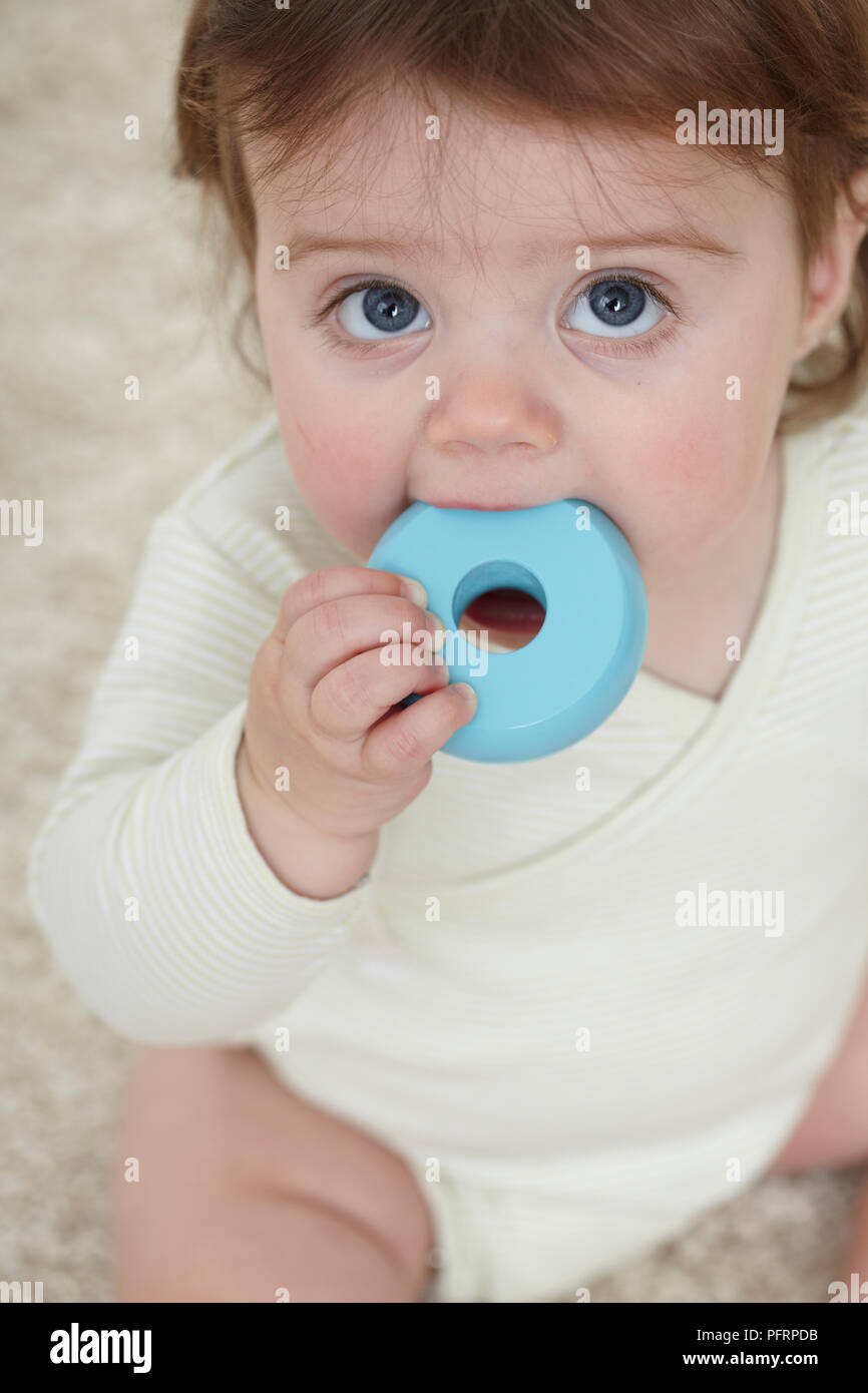 Close up baby girl chewing hi-res stock photography and images - Alamy