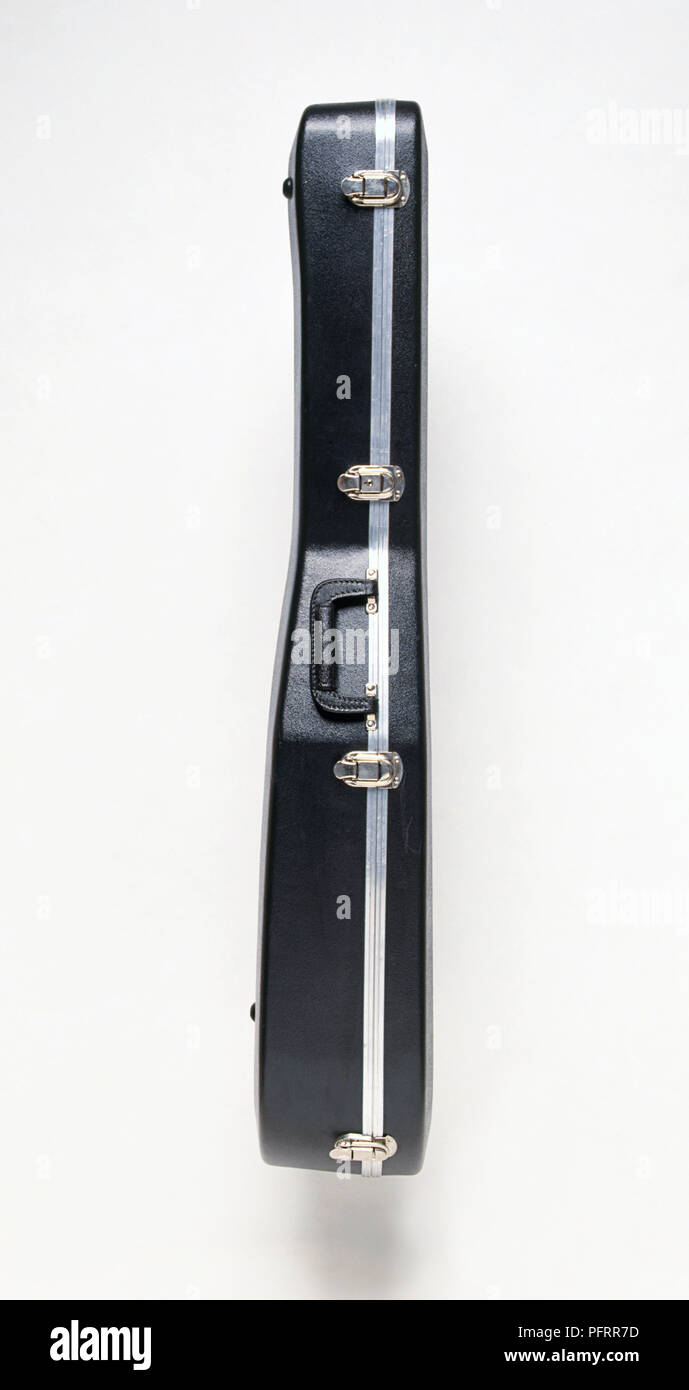 Black acoustic guitar case Stock Photo - Alamy
