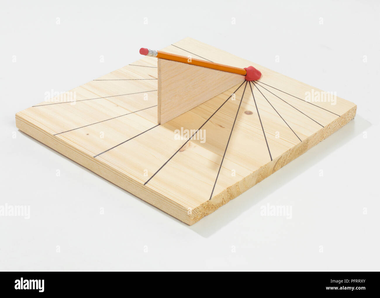 Sundial made from wood with pencil attached Stock Photo - Alamy