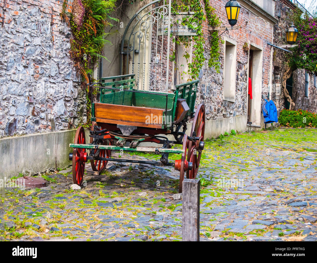 A colorful cart on a paved street in the old part f the city Stock ...