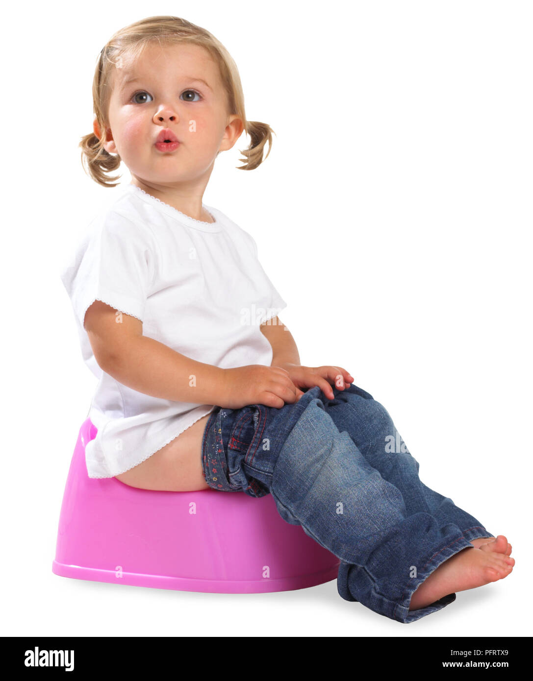 Girl sitting on pink potty, 1.5 years Stock Photo - Alamy