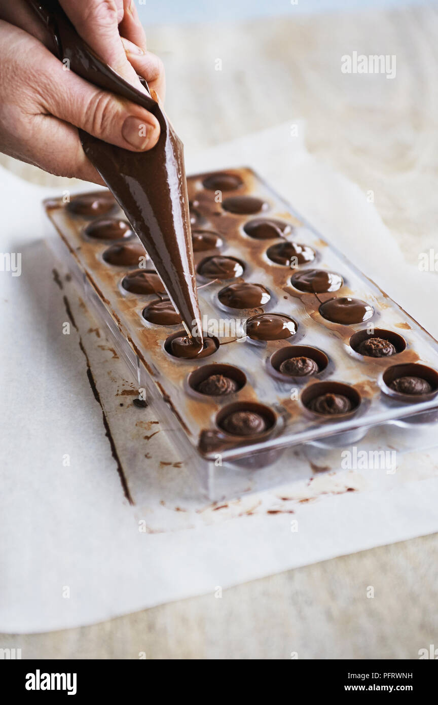 Melted chocolate preparation chocolate ganache hi-res stock photography ...