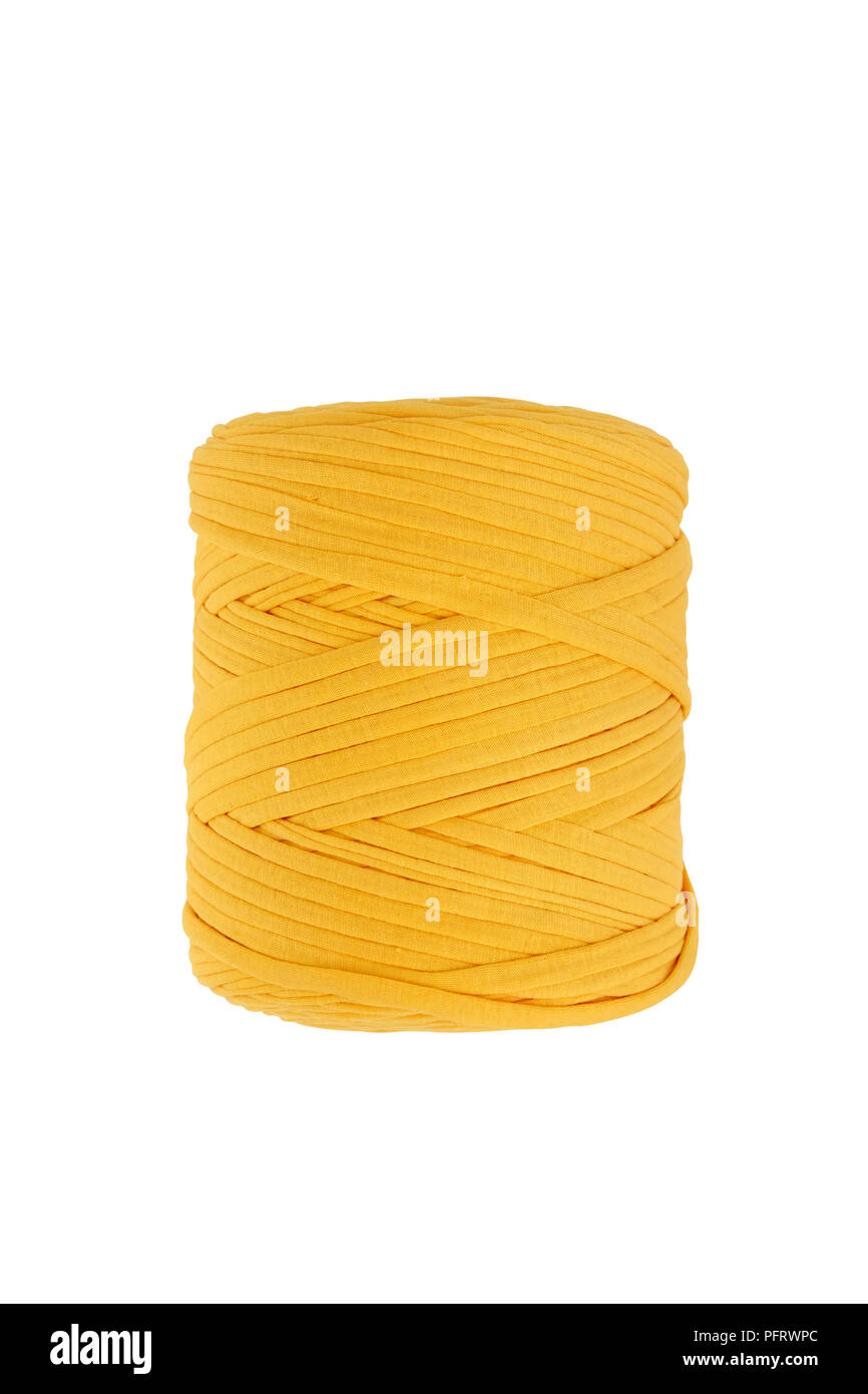 Ball of thick yellow yarn Stock Photo - Alamy