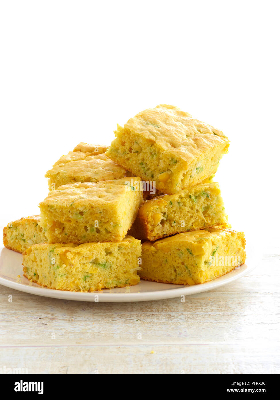 Stack of square slices of cornbread, piled on a plate Stock Photo - Alamy