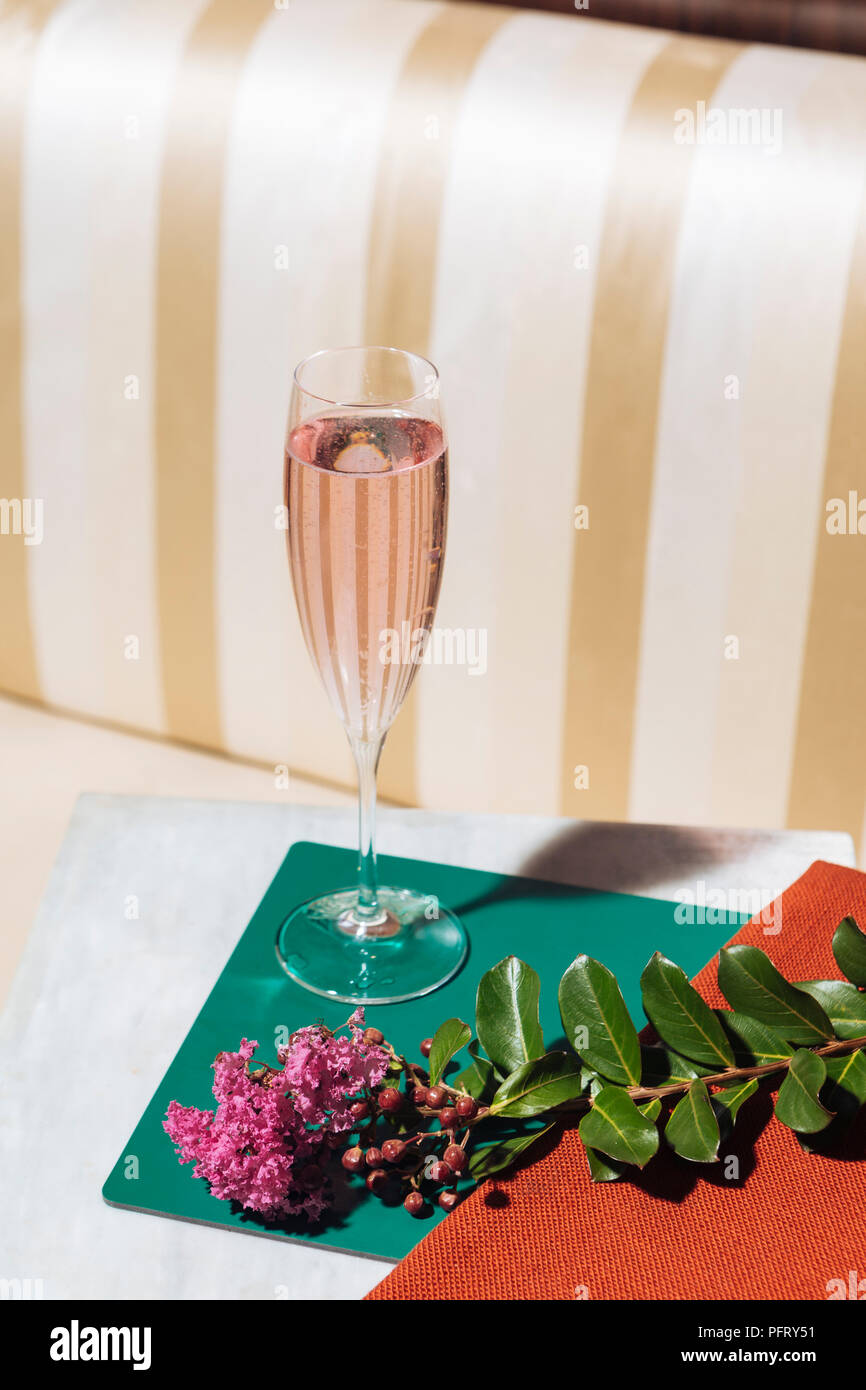 Prosecco glass in an elegant bar with vintage pop colors Stock Photo ...