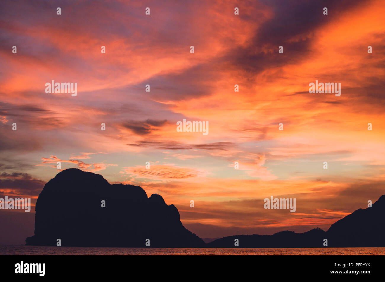 Tropical islands sunset; Unusual Thai island at beautiful and dramatic ...