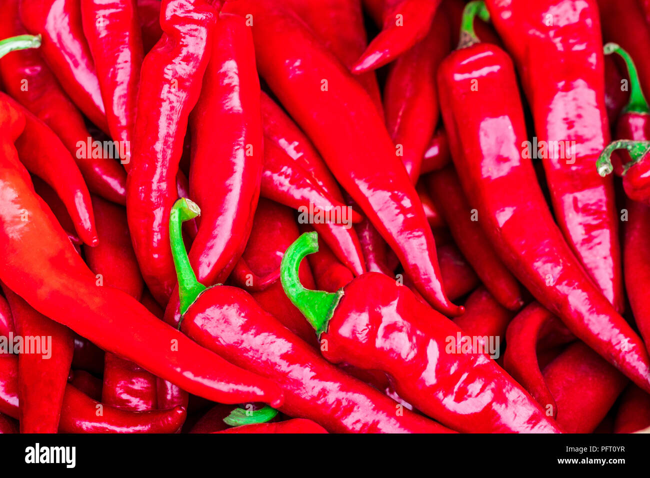 Red hot chilli peppers pattern texture background. Close up. Landscape ...