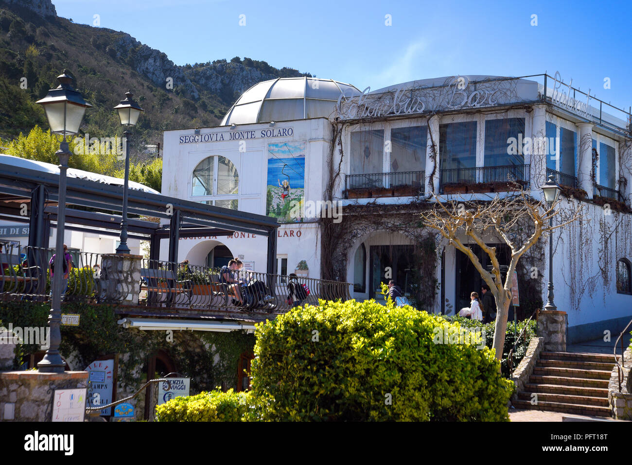 The main square of Anacapri with the chair lift up Monte Solara. This ...