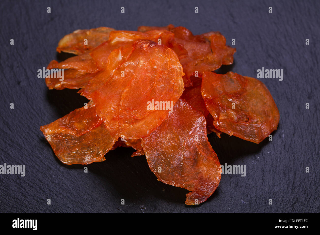 Dry chicken meat over wooden Stock Photo - Alamy