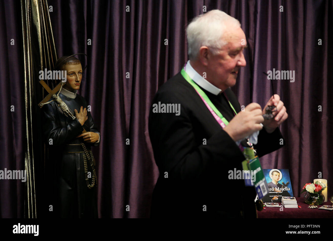 A Redemptorist priest at their exhibition stall in Dublin's RDS during ...