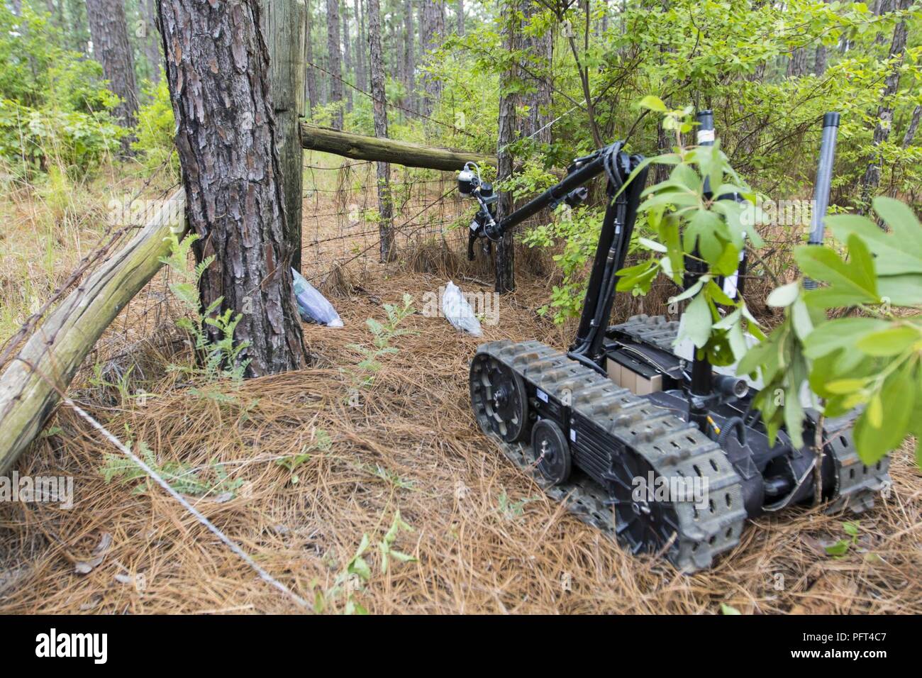 Explosive ordnance disposal technicians with the 705th Ordnance Company ...