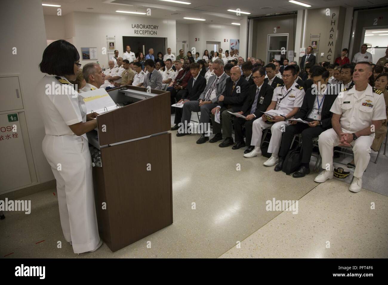 U.S. Navy Cmdr. Jessica Beard, officer in charge of Robert M. Casey ...