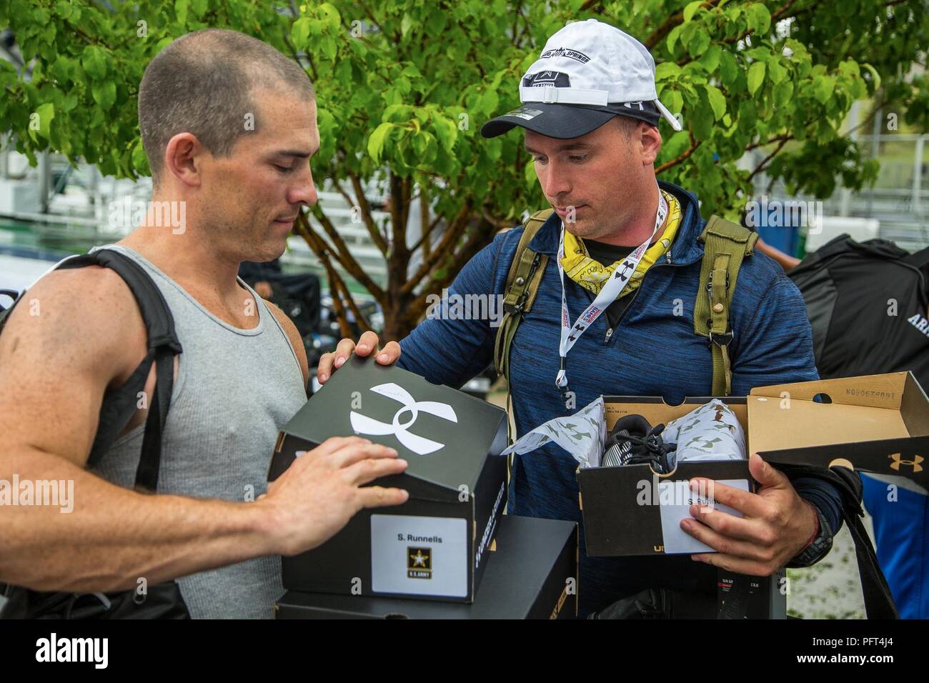 U.S. Army Staff Sgt. Shawn Runnells and Sgt. 1st Class Matthew Olson ...