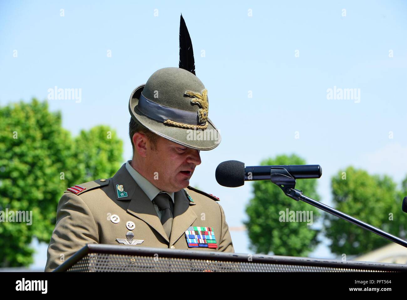 Italian Army Alpine, Sgt. Maj. Alessandro Cavallaro reads an Alpini ...