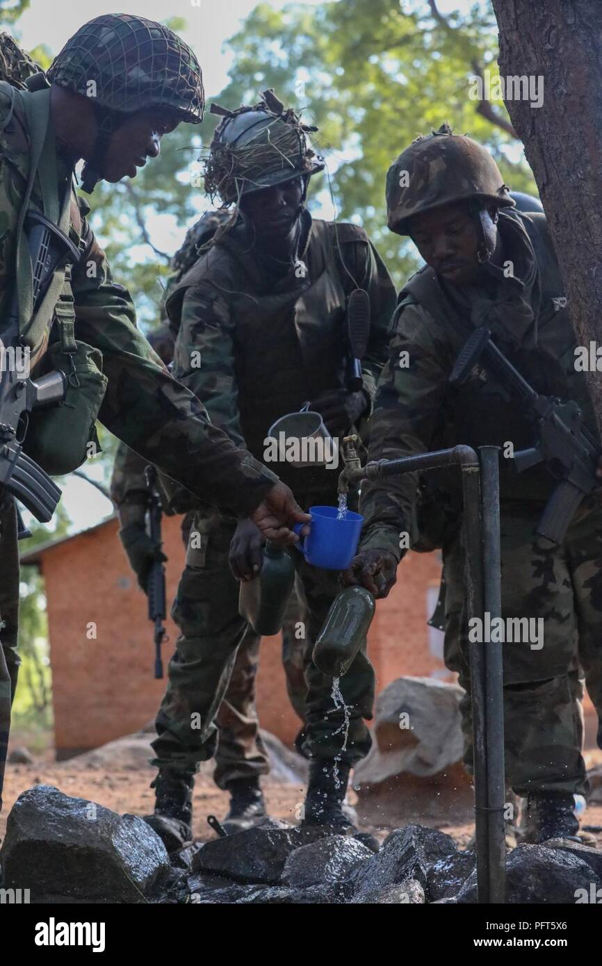 Malawi Defense Force soldiers prepare for a patrol during MALBAT 10 at ...