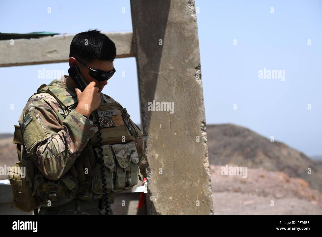 U.S. Army Spc. Carlos Flores, infantryman assigned to the 10th Mountain ...