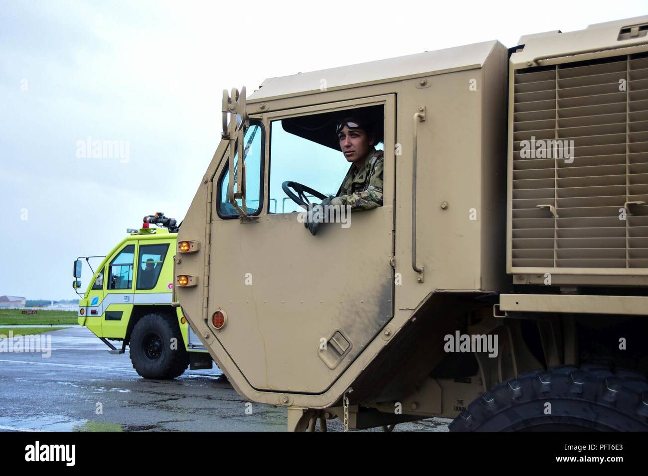 Staff Sgt. Jessica Hasty, 30th Troop Command, Supply NCO, waits on the ...
