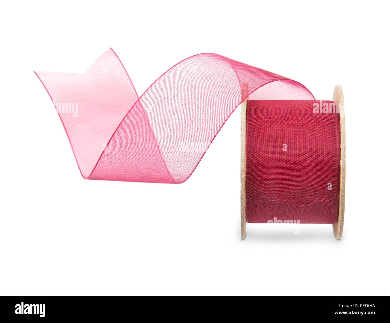 Roll of red ribbon Stock Photo - Alamy