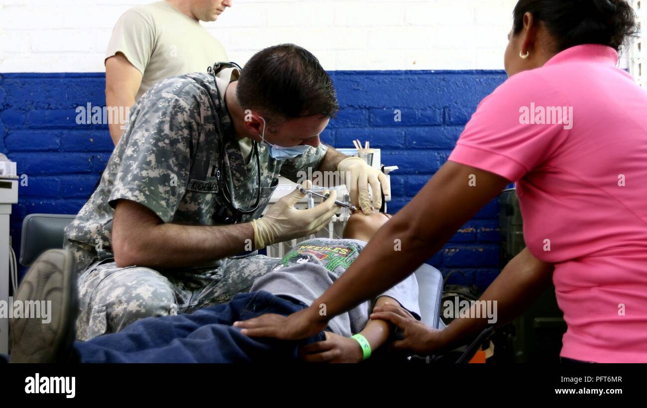 Tooth extraction in the military hi-res stock photography and images ...