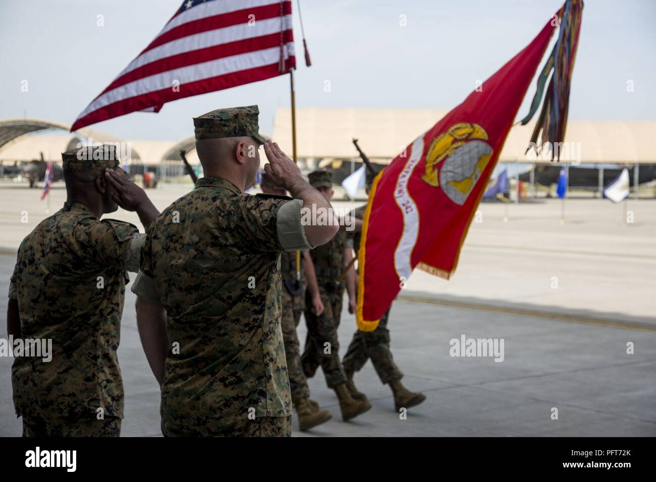 U.S. Marine Corps Lt. Col. Jabari J. Reneau, left, outgoing commanding ...