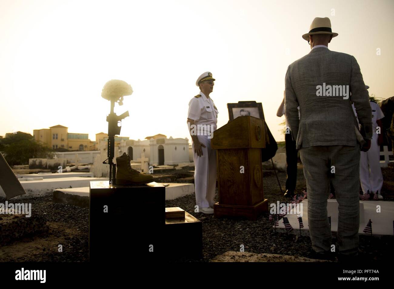 U.S. Navy Capt. John Tully, Senior Defense Official/Defense Attaché, at ...