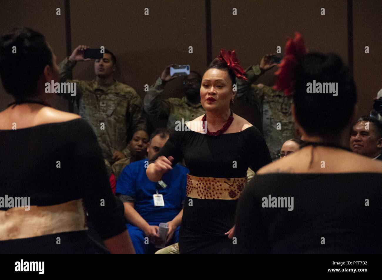 Members of Tama’ita’i Toa O Samoa, prepare to perform a Polynesian ...