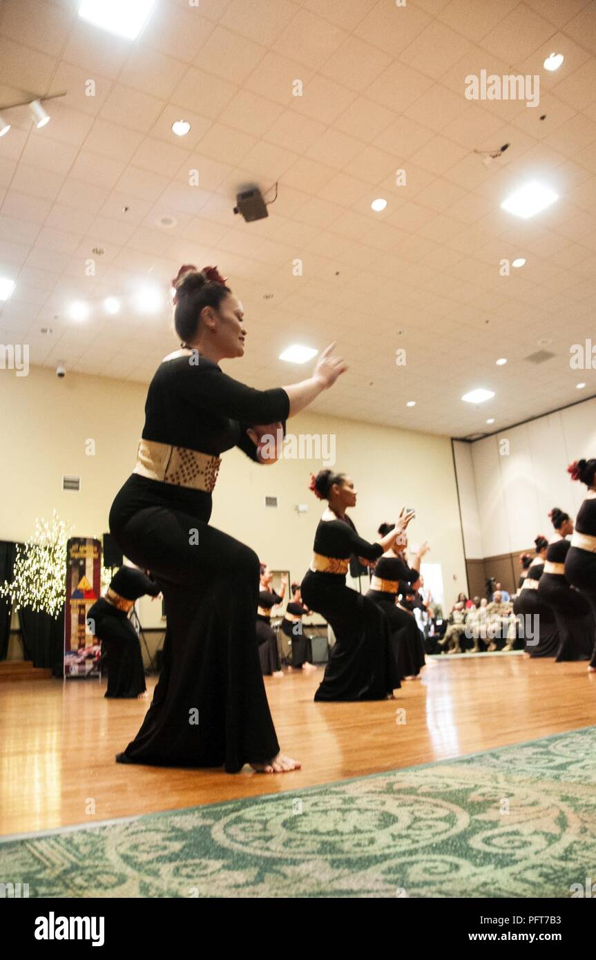 Members of Tama’ita’i Toa O Samoa, perform a Polynesian dance during ...