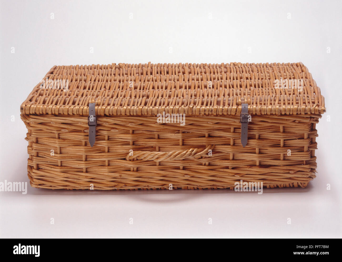 A wicker suitcase Stock Photo - Alamy
