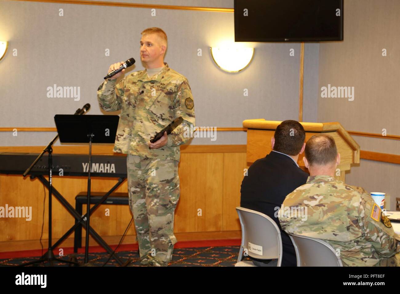 Lt. Col. Jared Corsi, deputy garrison commander, provides comments ...