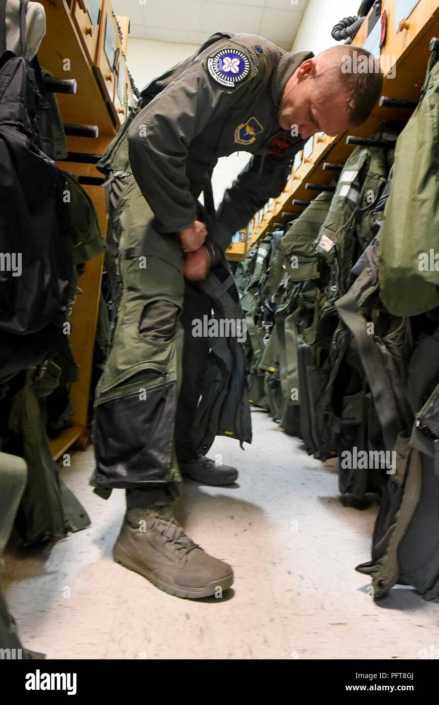 Lt. Col. Mitchell Cok, 88th Fighter Training Squadron commander, puts ...