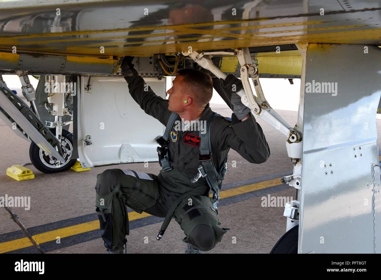 Lt. Col. Mitchell Cok, 88th Fighter Training Squadron commander, checks ...