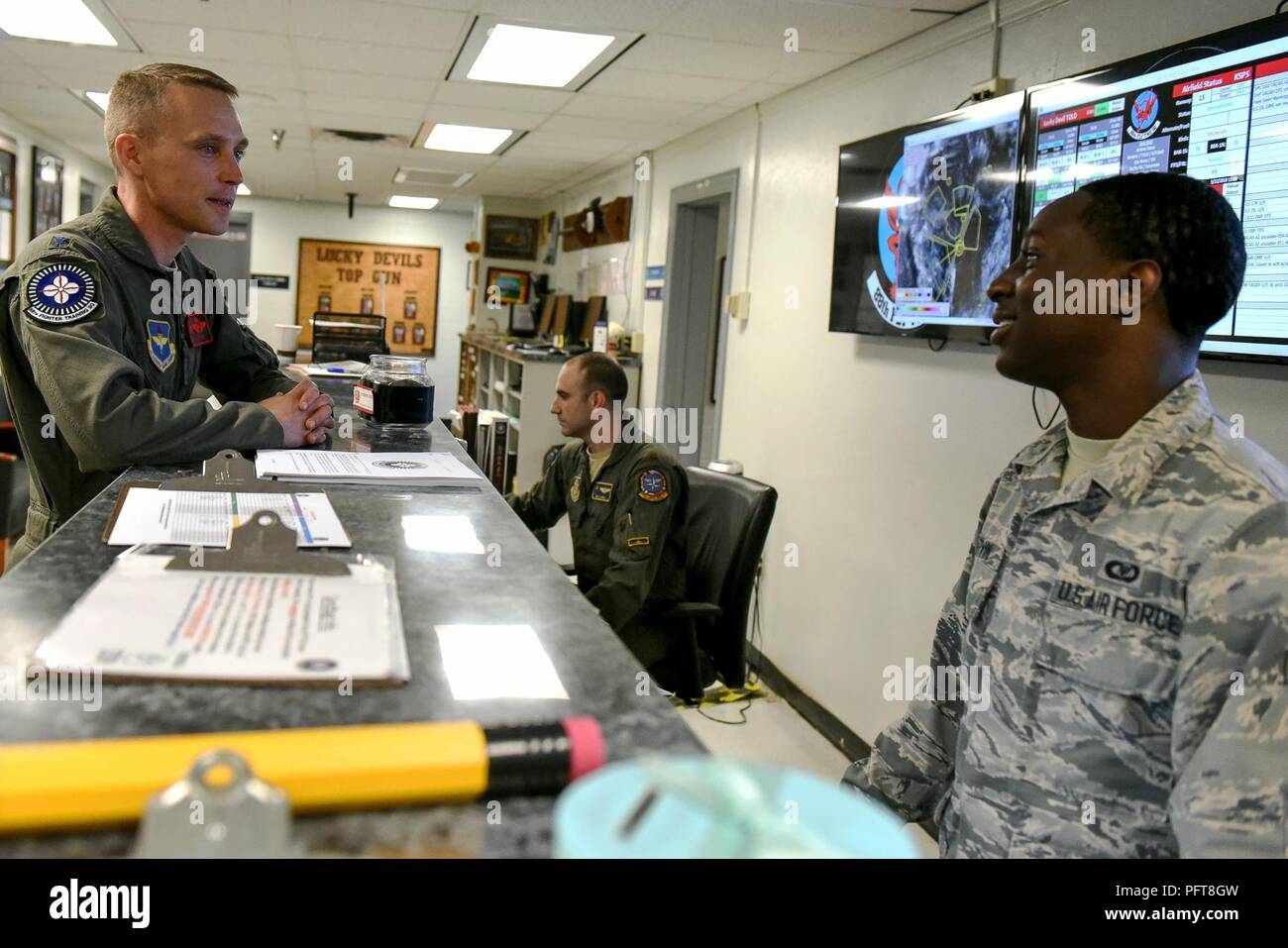 Lt. Col. Mitchell Cok, 88th Fighter Training Squadron commander, talks ...