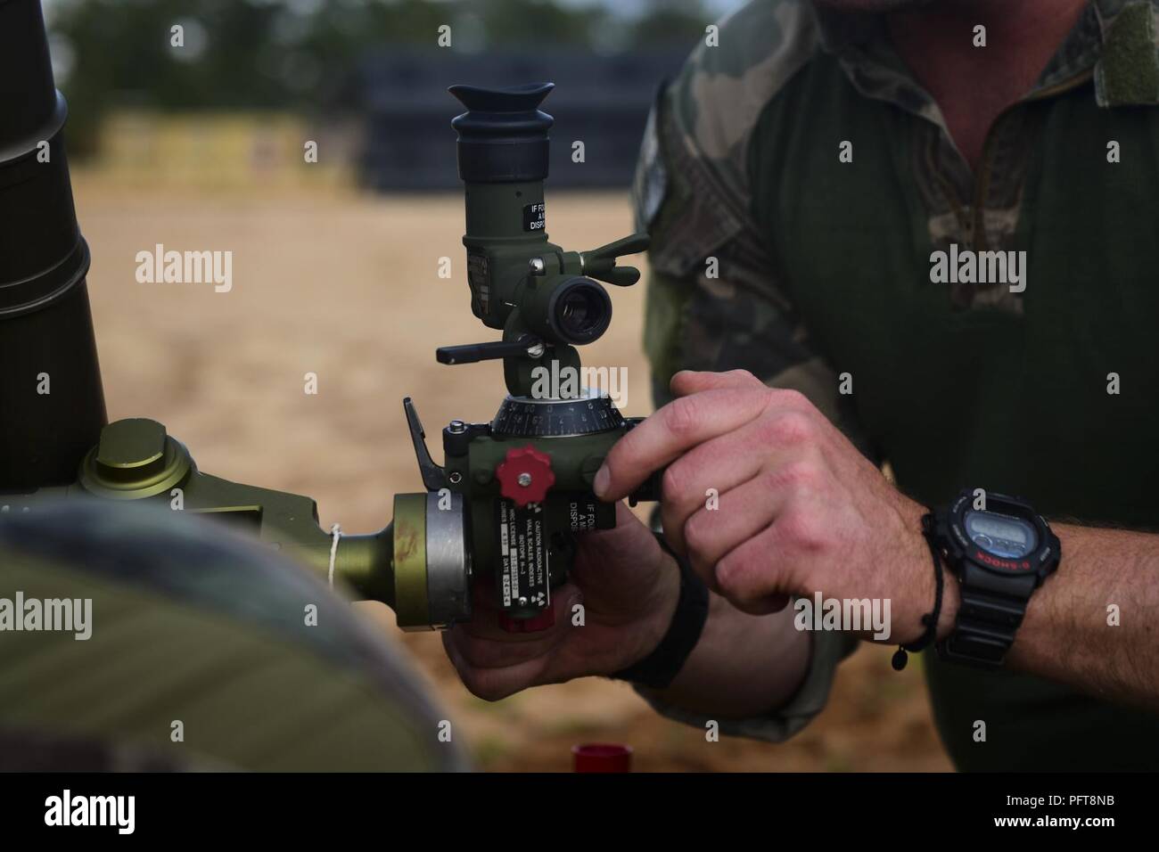 A U.S. Marine Corps Raider with the 3d Marine Raider Battalion adjusts ...