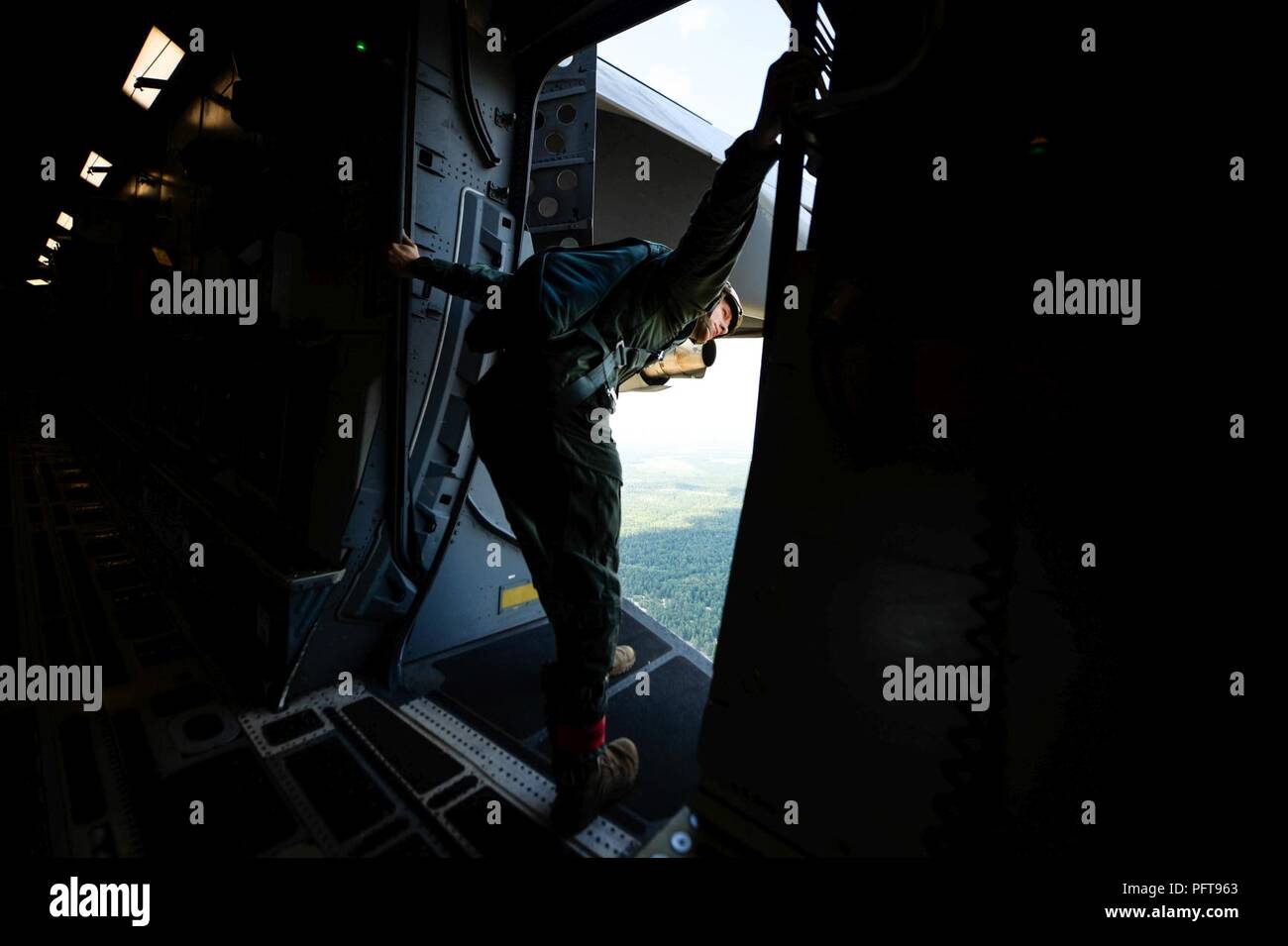 A U.S. Army jump master with the 509th Infantry Regiment, Fort Polk ...
