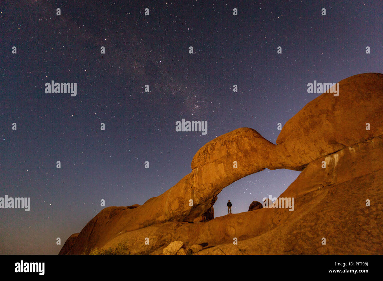 Milky Way shines over an arch in the desert in Namibia Stock Photo - Alamy